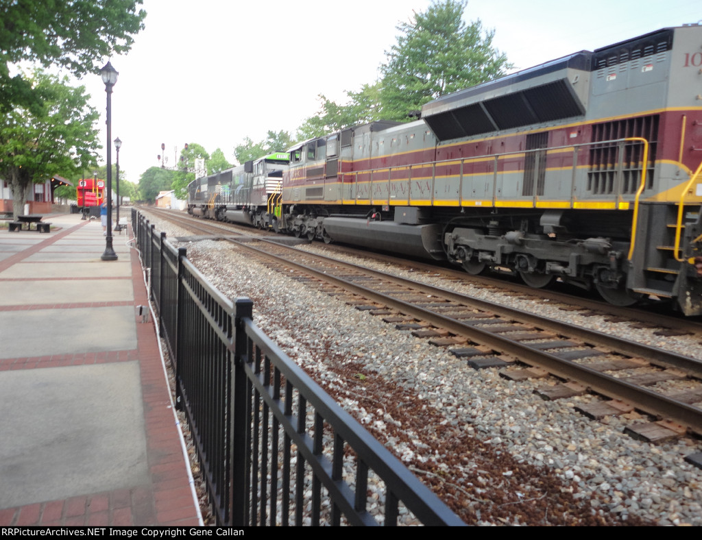 NS 6680 followed by the "Go Rail" and Lackawanna Heritage Unit